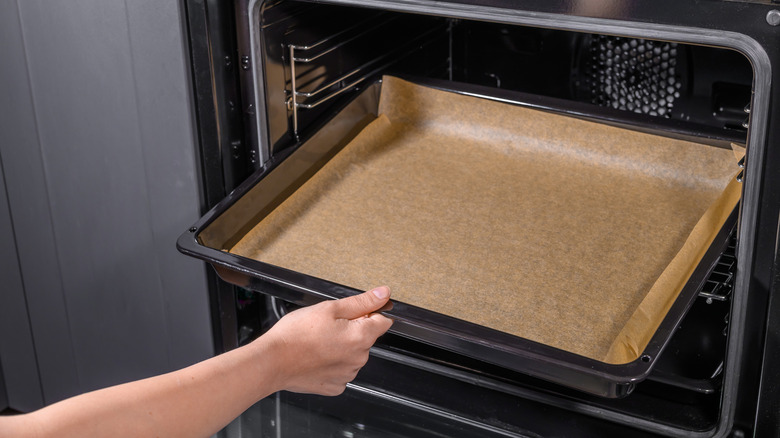 The genius baking pan storage hack that frees up space in cabinets