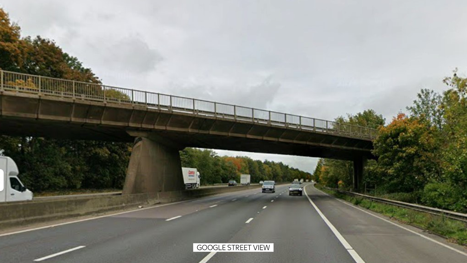 Two teenagers dead after car falls off bridge and crashes into minibus
