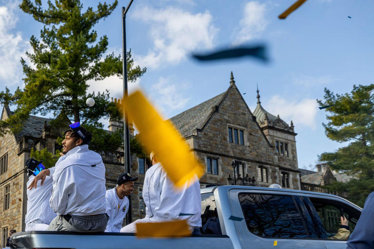 Photos: Thousands pack Ann Arbor streets to welcome Michigan basketball ...