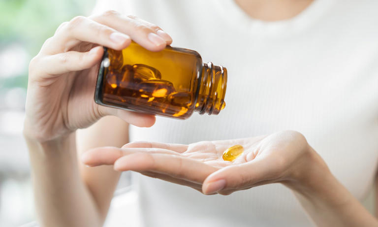 Taking a daily vitamin D supplement may help ease the symptoms of ...