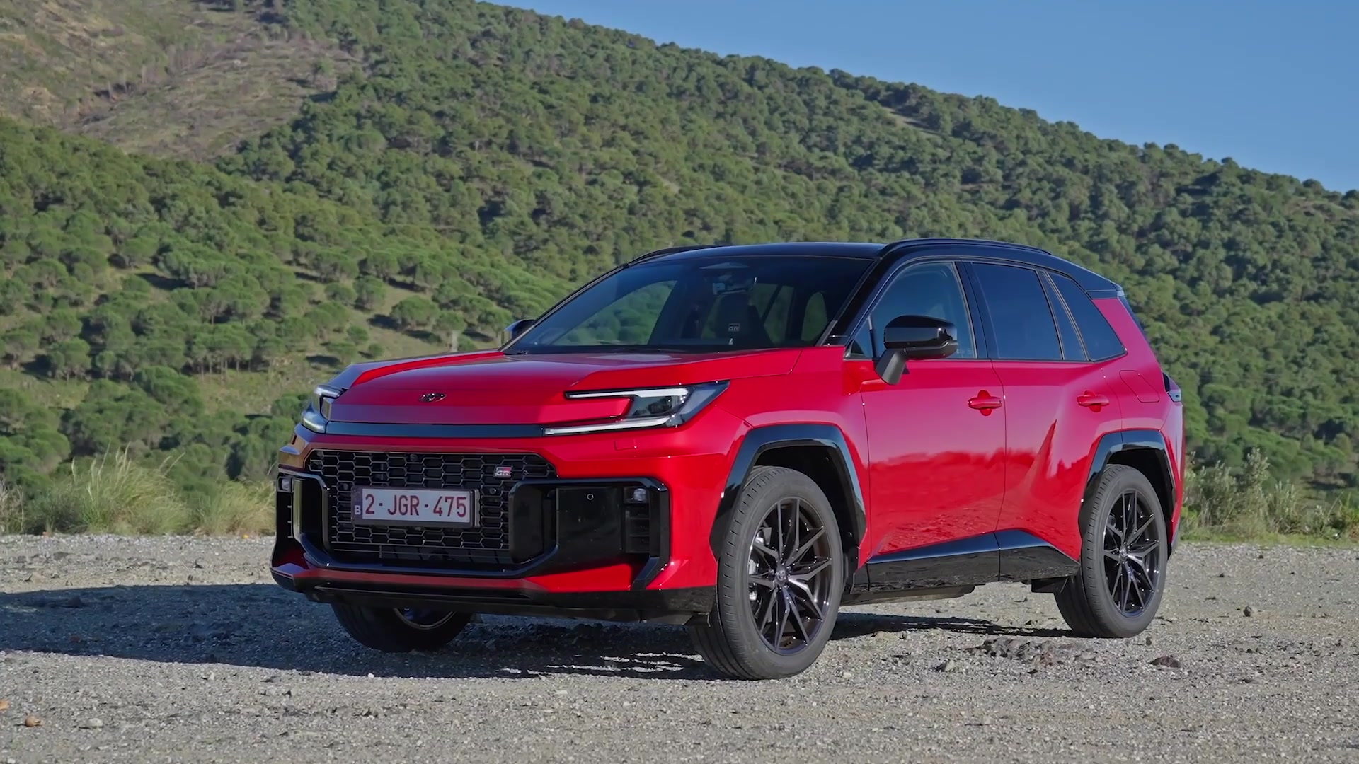 2026 Toyota RAV4 HEV design preview in emotional red