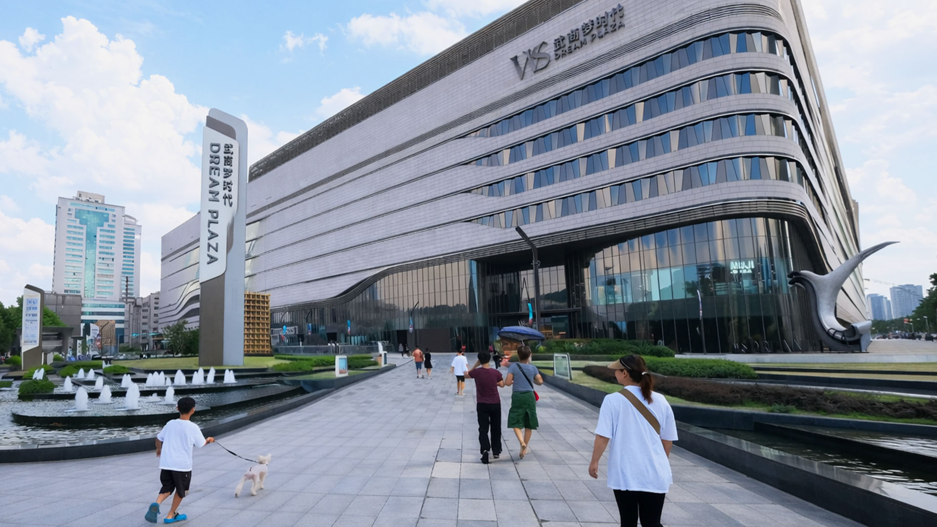 People enjoying relaxed walk near large commercial building in city