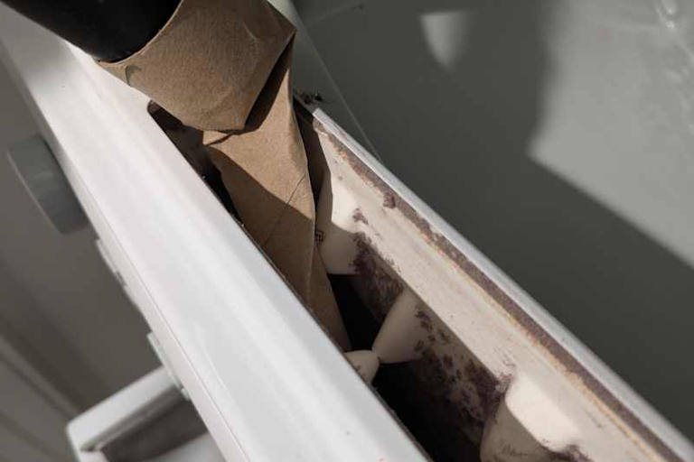 I used the vacuum paper towel tube hack to clean my dryer lint trap