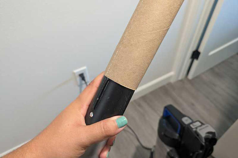 I used the vacuum paper towel tube hack to clean my dryer lint trap