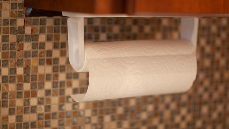 Swap a basic paper towel holder for a vintage wood one