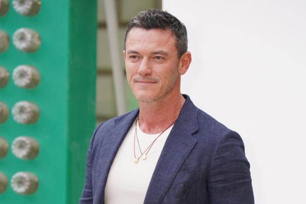 Luke Evans re-enacts Disney meme on South Wales streets in 'dream come ...