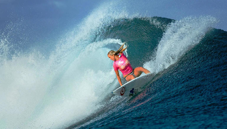 She lost an arm in a shark attack but returned to become a professional ...