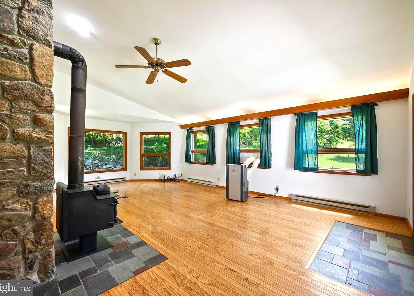 Discover a 1972 two-story home in Stanley, Virginia, featuring a serene ...