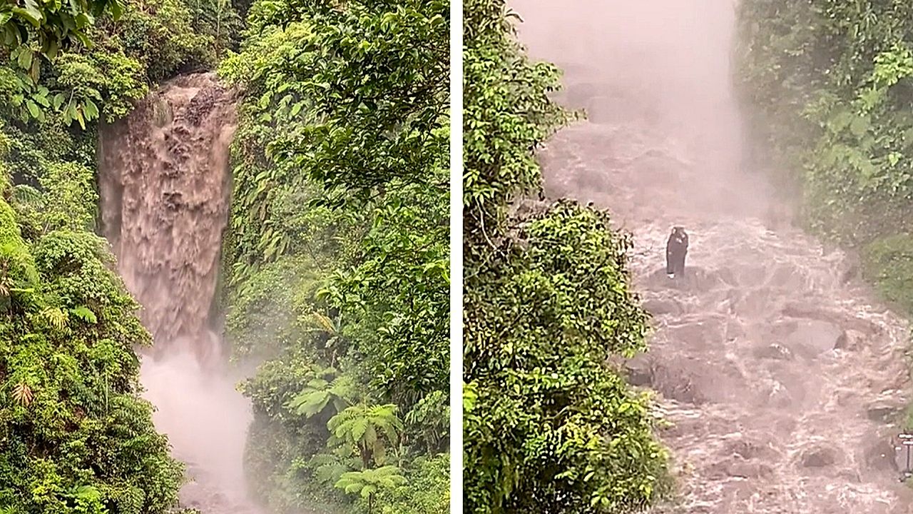 Two tourists trapped by flash flood at waterfall in Indonesia