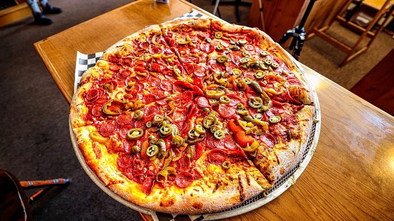 Eat this pizza fast enough and they name it after you | Philly ep.4 ...