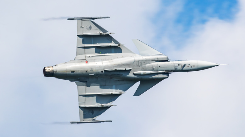 What does Saab mean and what kind of military equipment does it make?