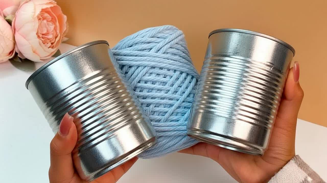 How beautiful! Look what I made with tin cans and macrame rope! The ...