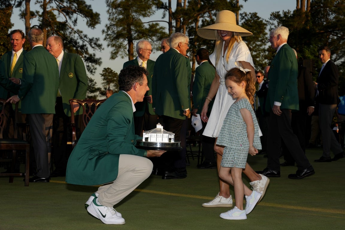 Erica Stoll, wife of back-to-back Masters winner, in photos