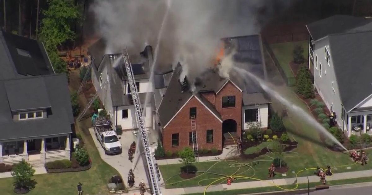 Durham house fire: One firefighter burned, another shocked by solar ...