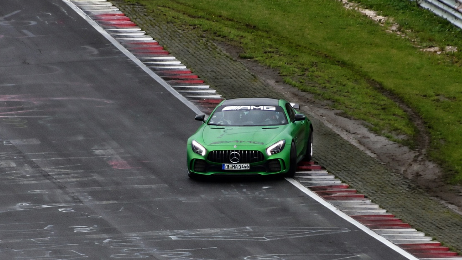 Mercedes AMG GTR nearly loses control on circuit corner