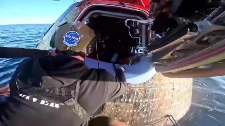 Moment: Recovery crew opens Orion capsule hatch, welcomes Artemis II ...