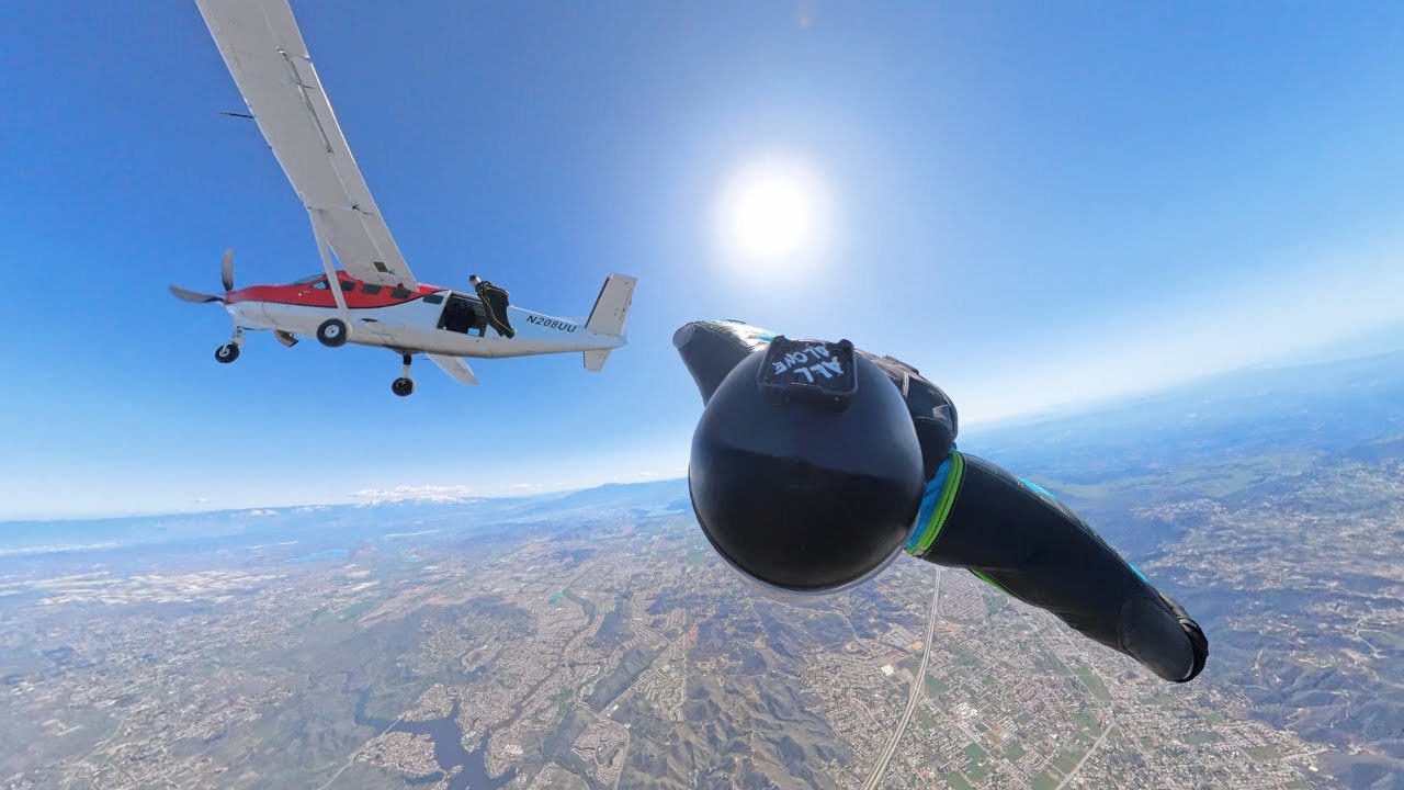 Man jumps from 500ft plane - and the big wingsuit 360° flight feels unreal