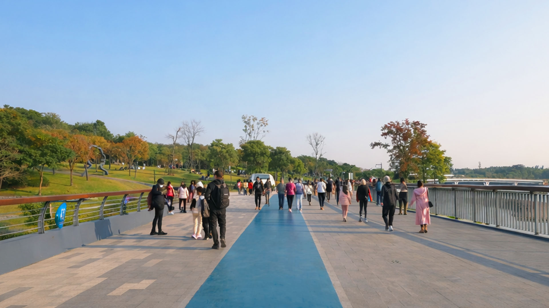 Visitors spend time walking and socializing along the river