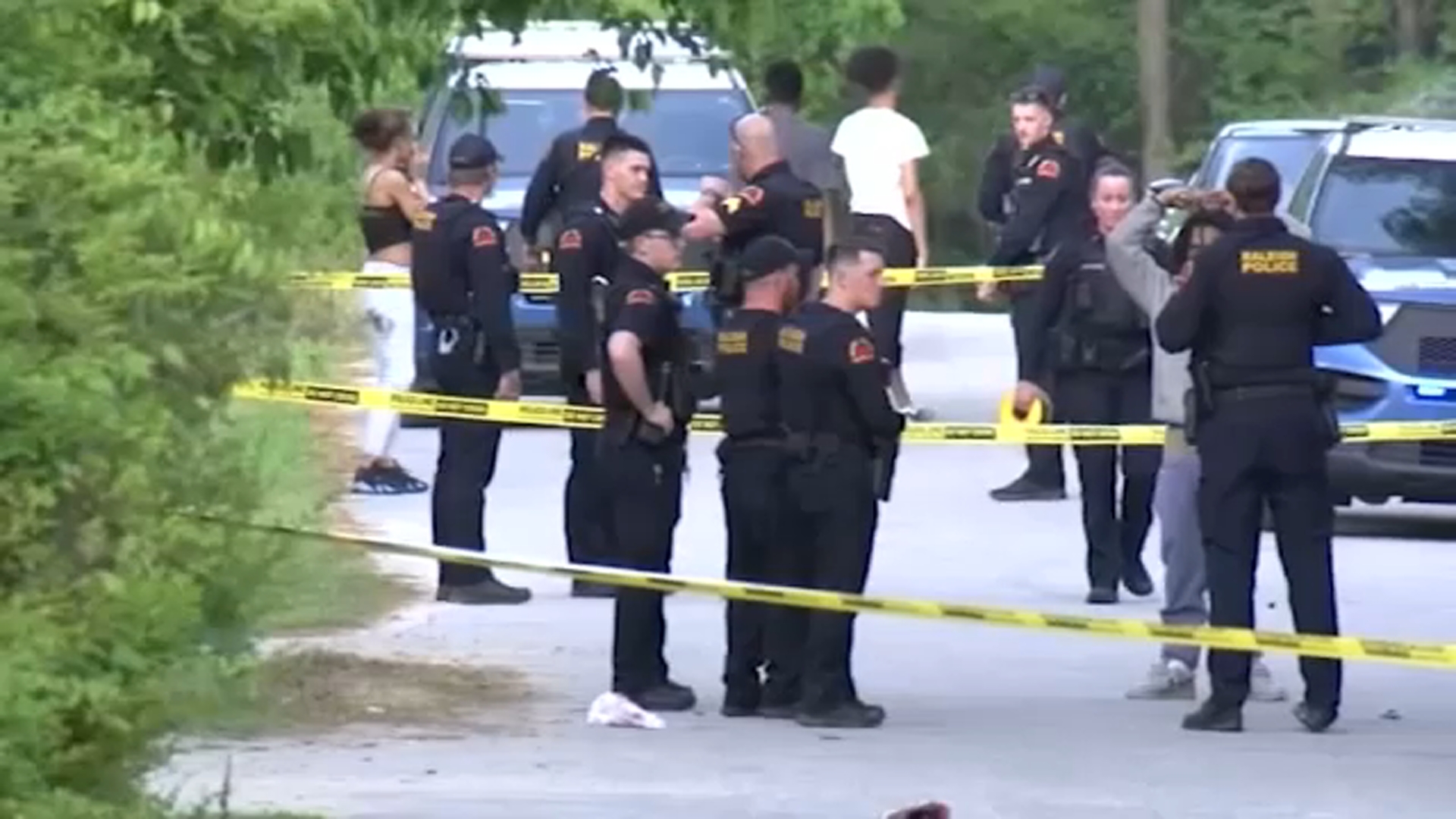 Man dies after being shot during fight, woman and 2 others facing charges