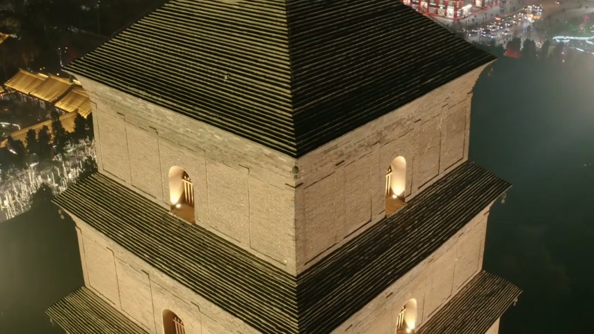 Above ancient Xi'an: Terracotta warriors and glowing city streets
