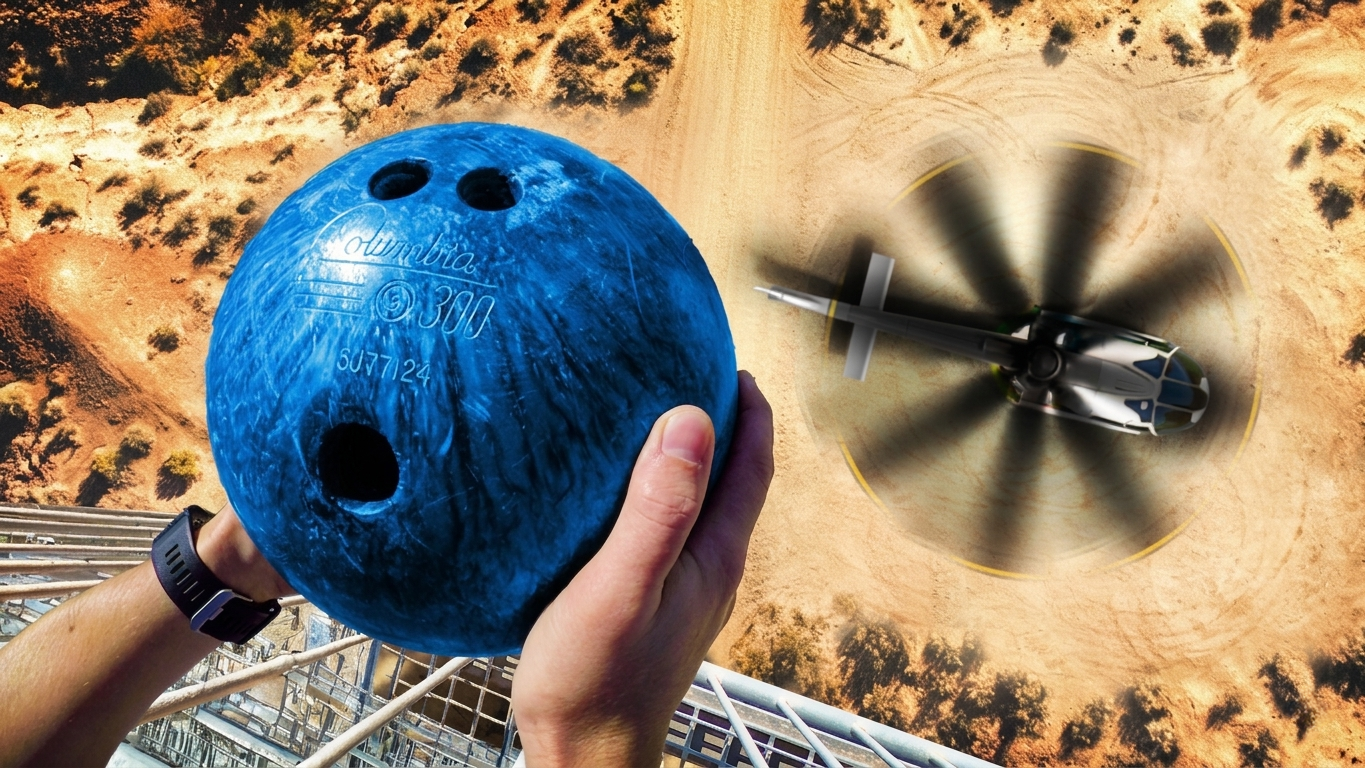 Watch what happens when a bowling ball hits helicopter blades