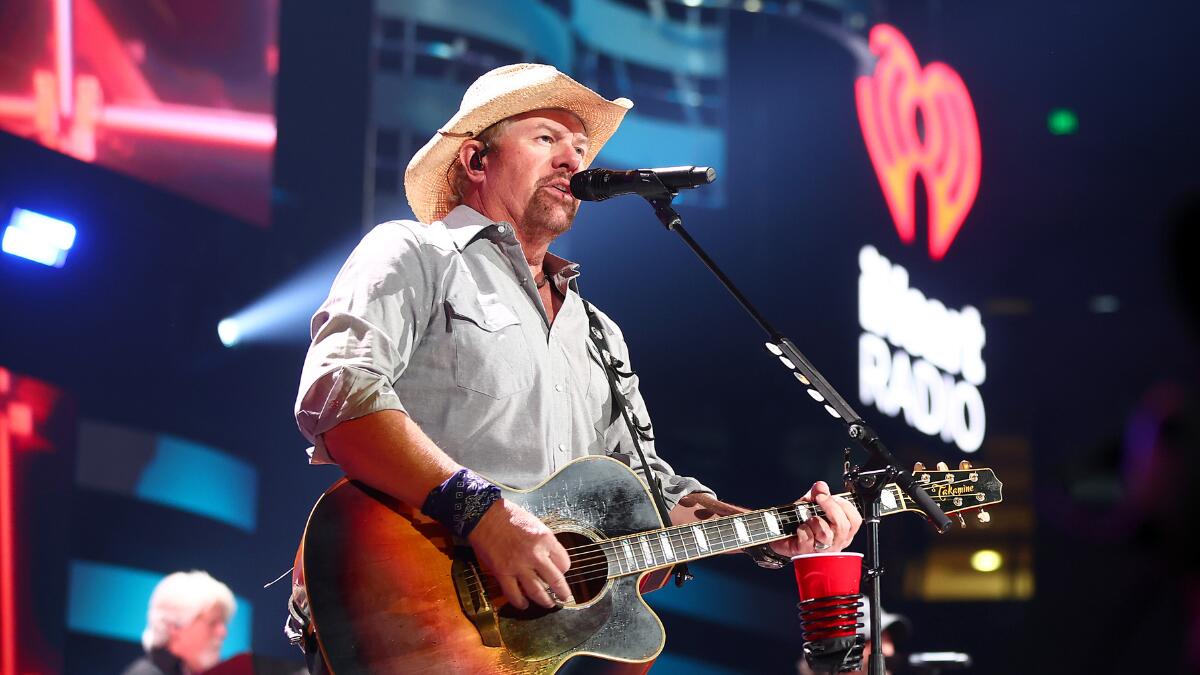 Toby Keith's family accepts honor on late legend's behalf — see the photos