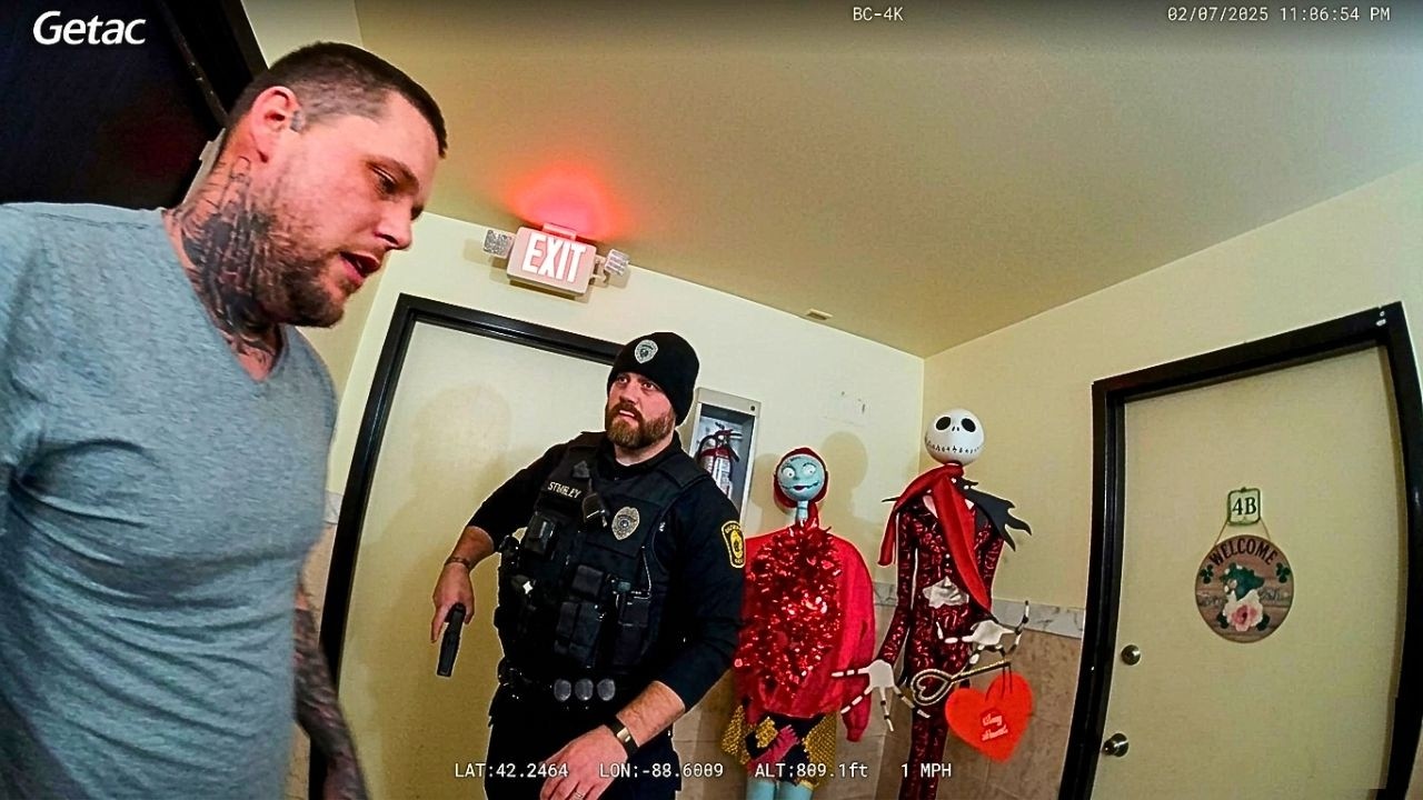 Cops break down door to stop husband from killing his own wife
