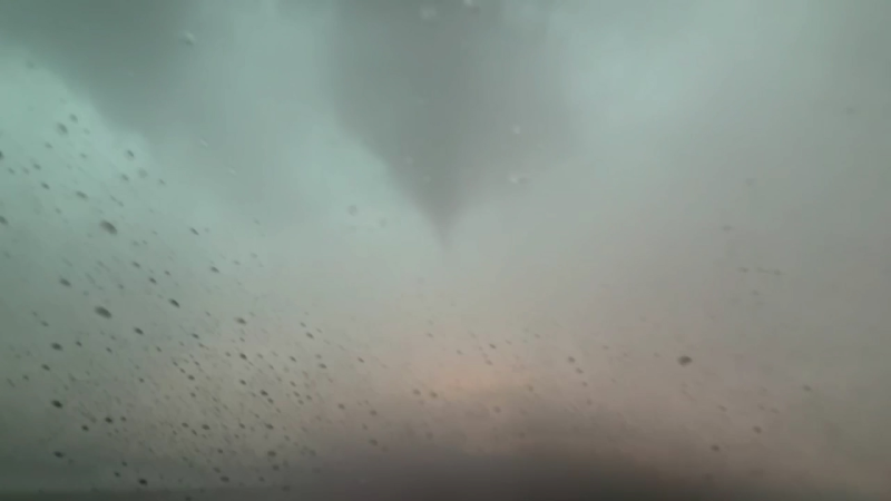 Rain-wrapped tornado sweeps through Iowa