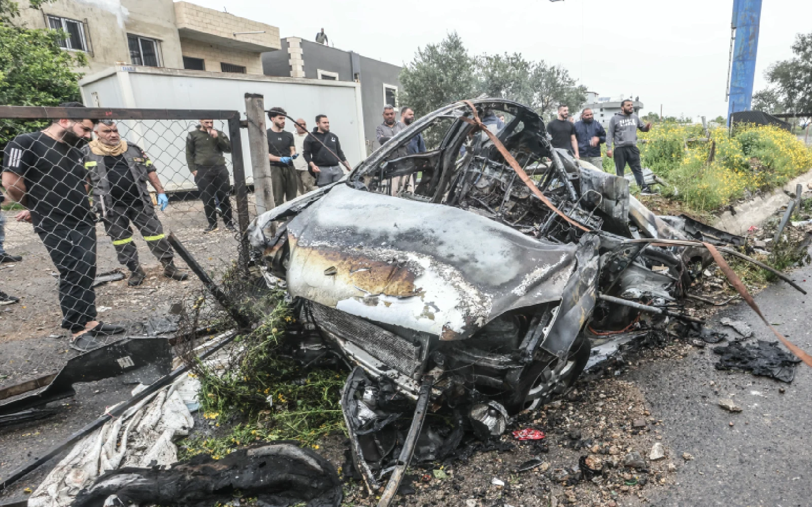 Israeli army strikes south of Beirut as Hezbollah launches rockets