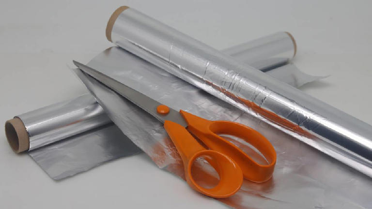 This aluminum foil hack keeps birds away from grass seed — and it ...