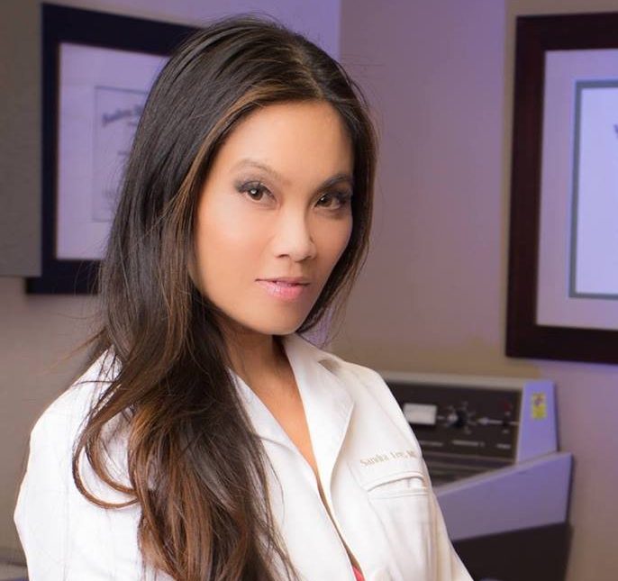 Dr Pimple Popper says 'part of her brain died' after she suffered a ...