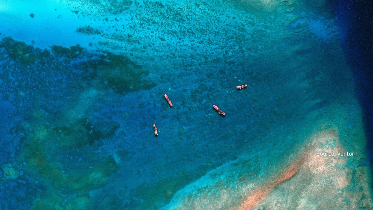 Satellite images show Chinese barrier at disputed Scarborough Shoal ...