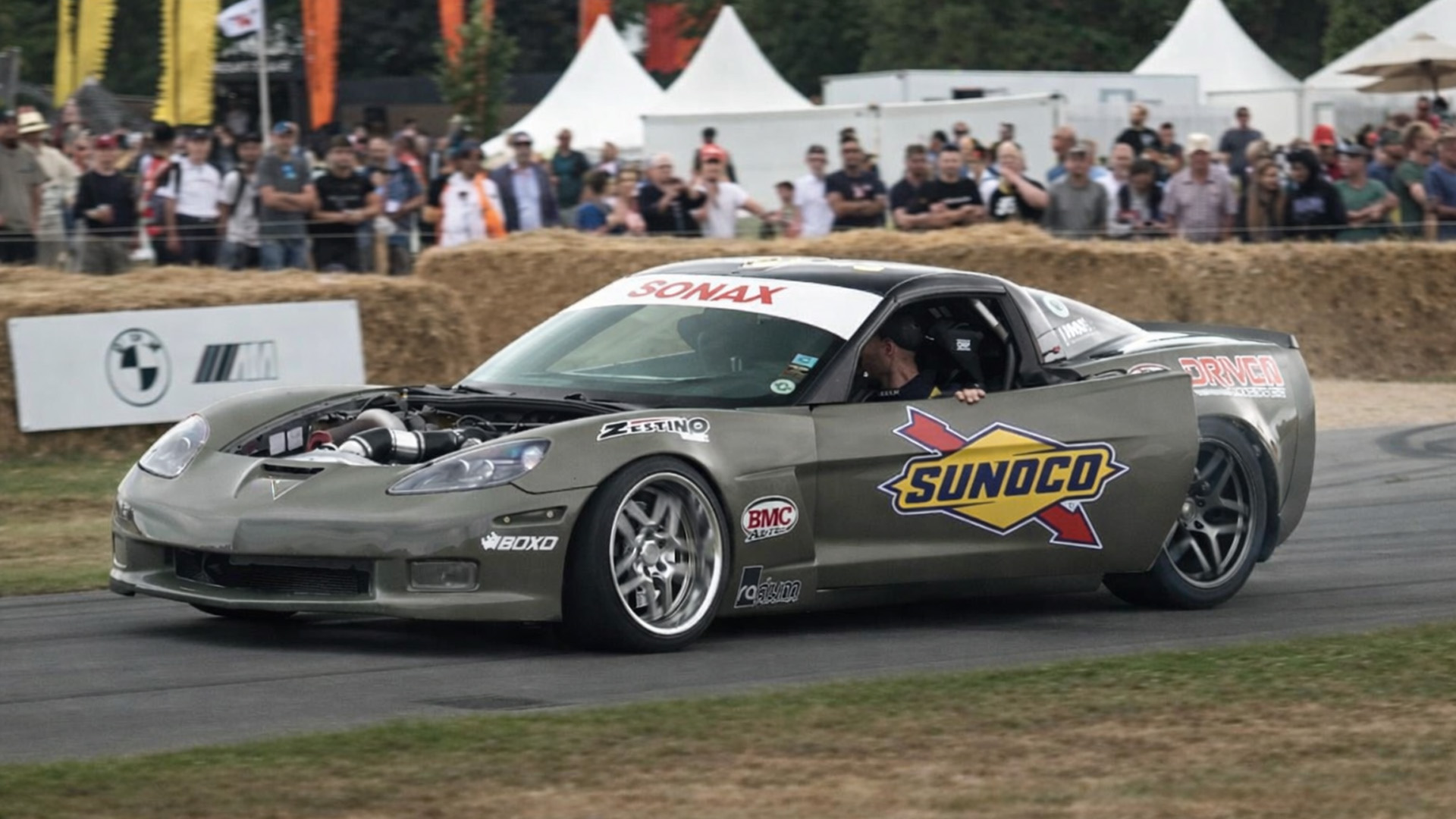 Corvette C6 dangerous drift with the door open on circuit