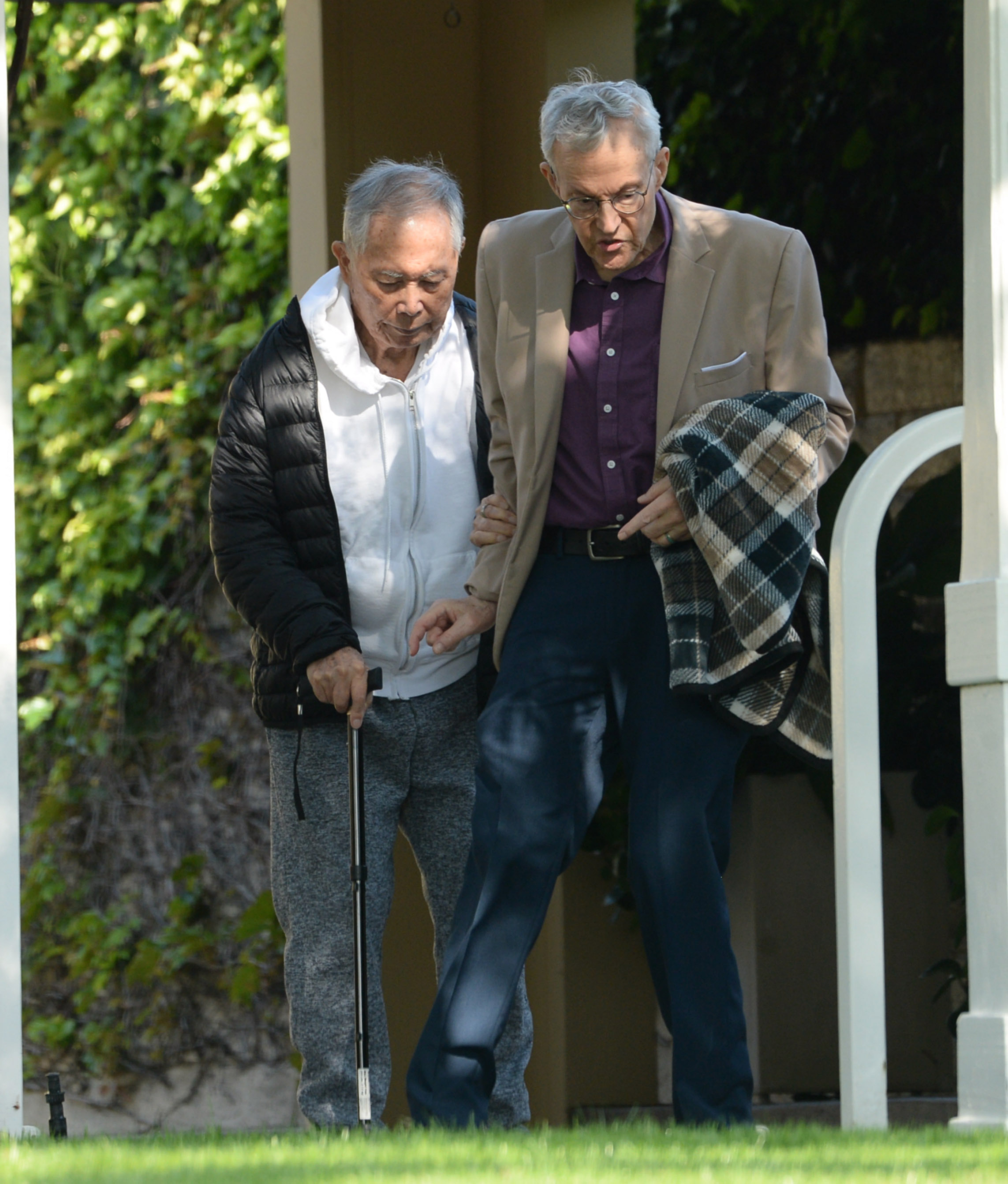 Star Trek icon George Takei, 88, leans on husband to walk in rare sighting