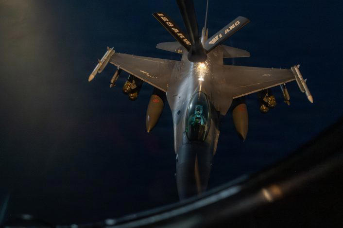 US F-16 shown with mine-dispensing cluster bombs