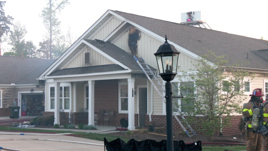 Five residents displaced after garage fire severely damages ...