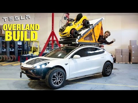 Ultimate off road Tesla is finished! Roll cage and roof tent