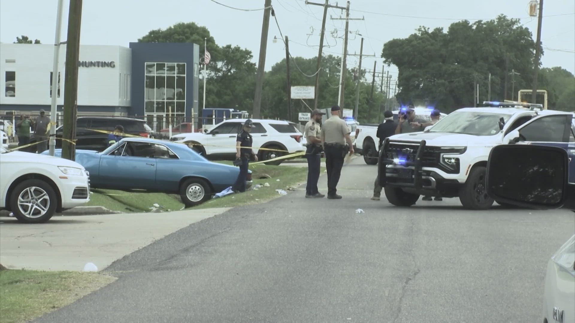 At least 13 hurt after car plows into parade, driver faces multiple charges