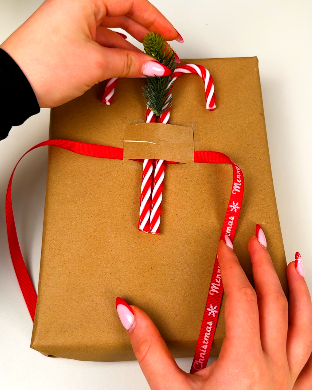 Elevate your gift wrapping with candy cane magic 🎁