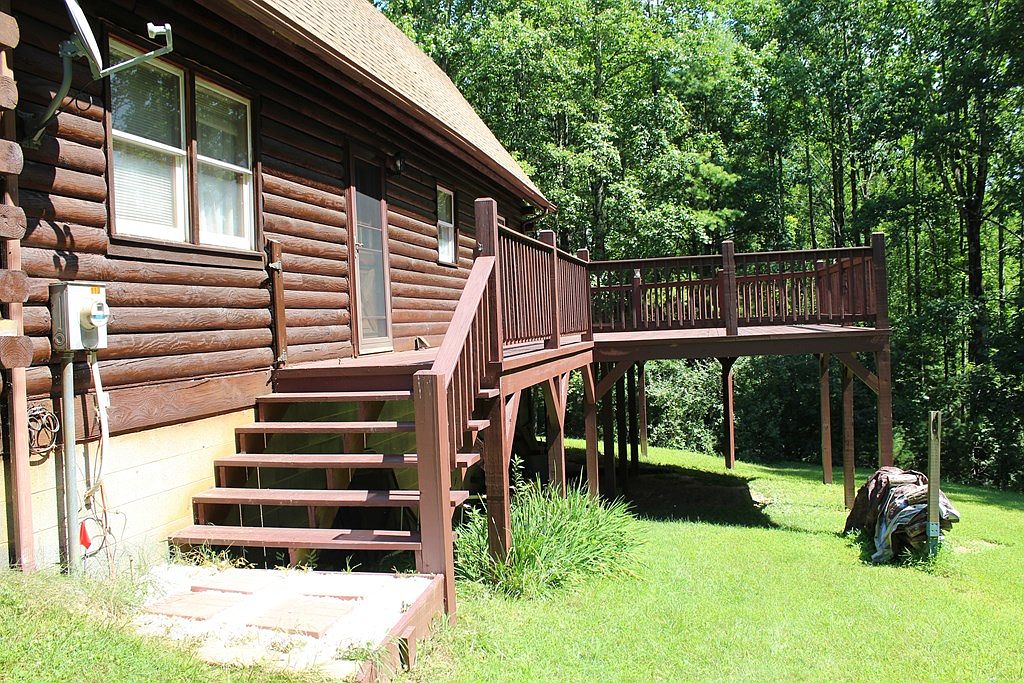 1981 mountain cabin in Fancy Gap, Virginia, featuring a stone fireplace ...