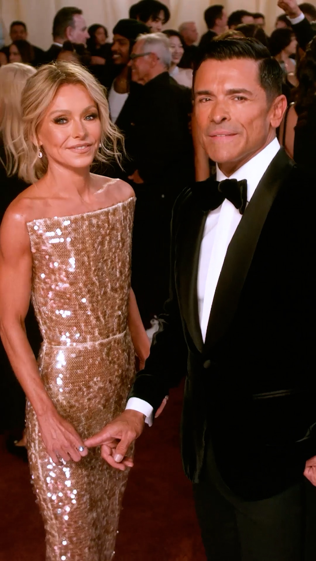Kelly Ripa and Mark Consuelos slay the Glambot
