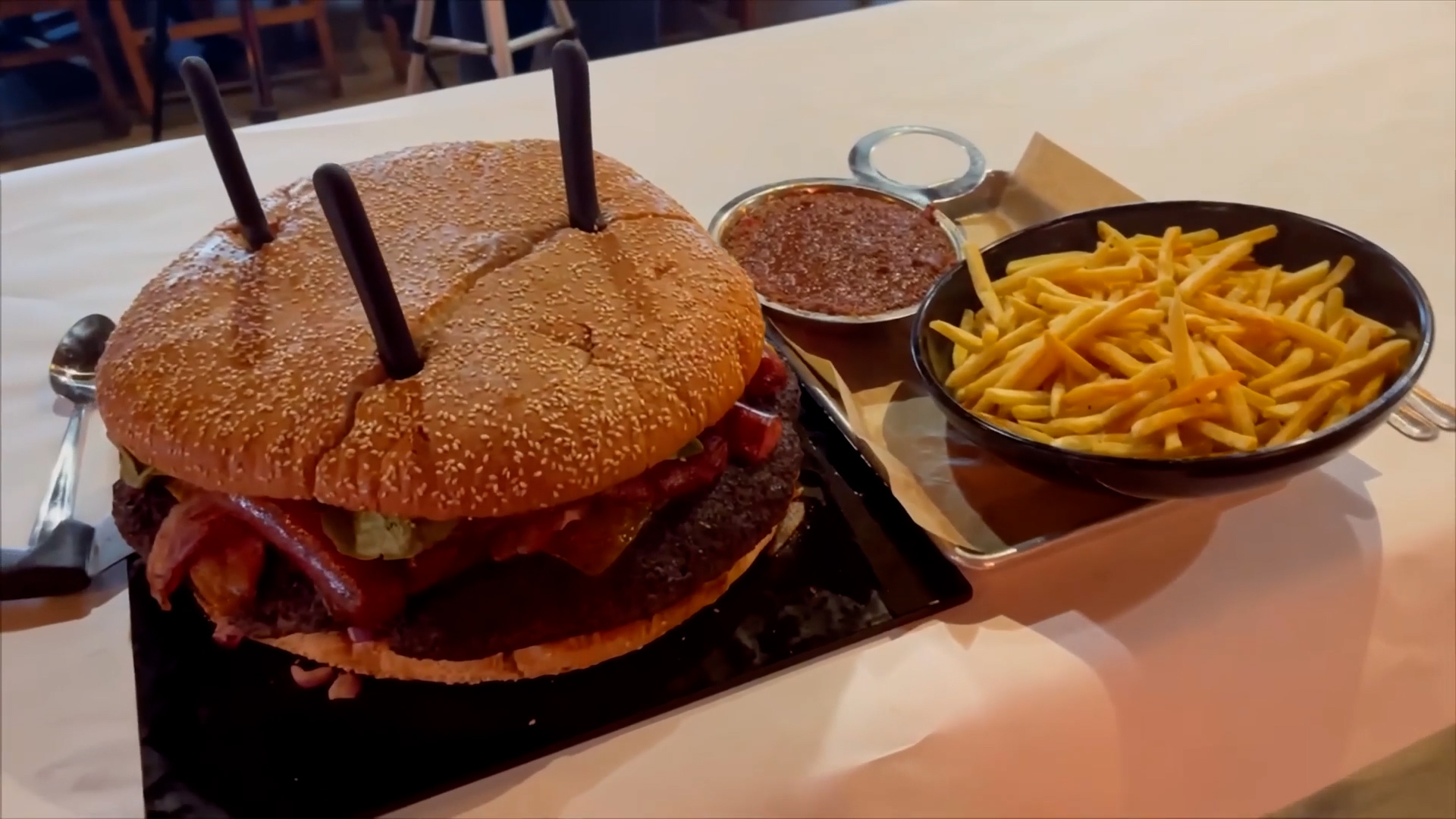Two pro eaters attempt 15lb 'Frankenstein' burger challenge - almost ...