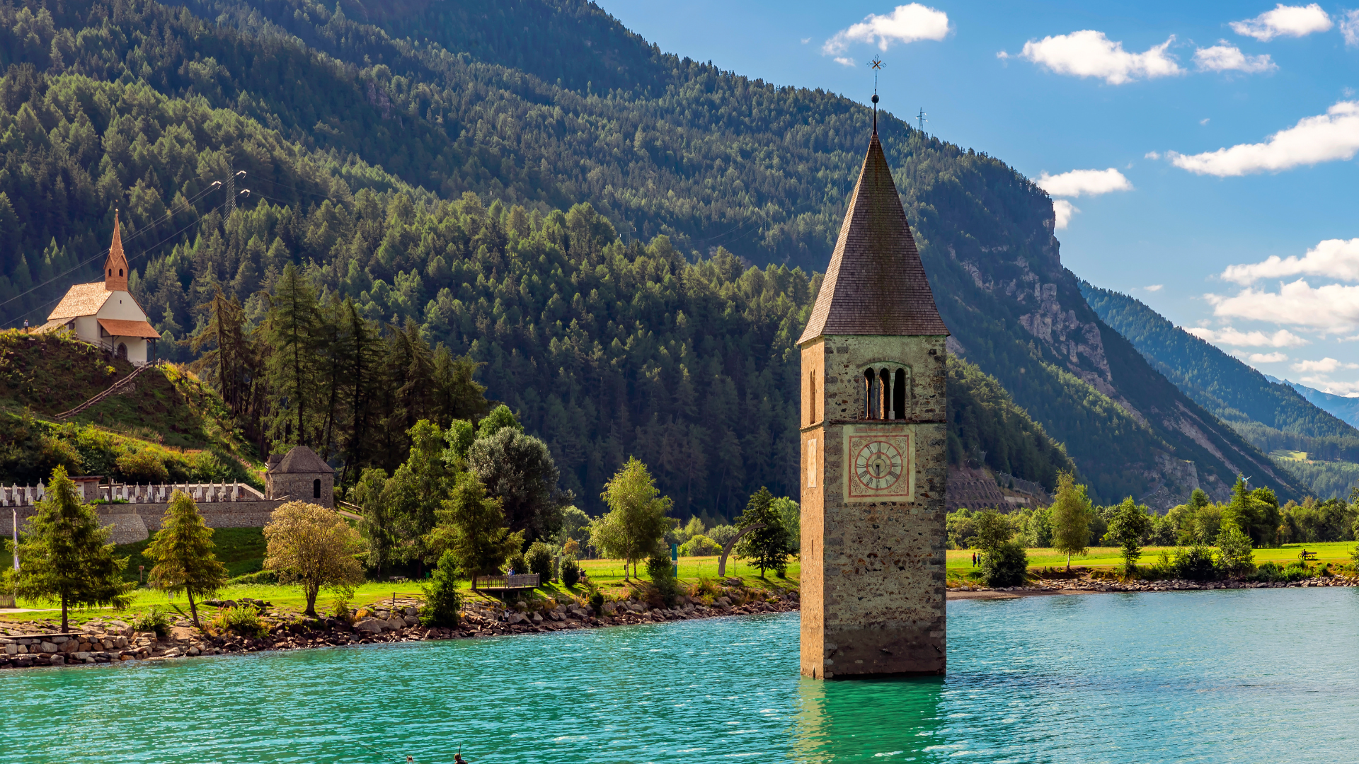 In Italy, this stunning lake hides an entire village submerged beneath ...