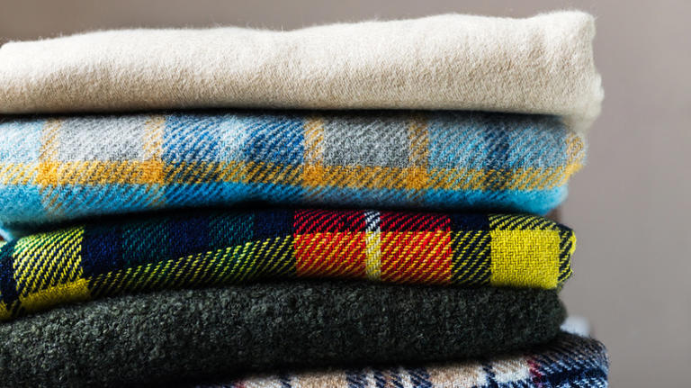Turn scrap wood into a simple blanket storage solution for small spaces