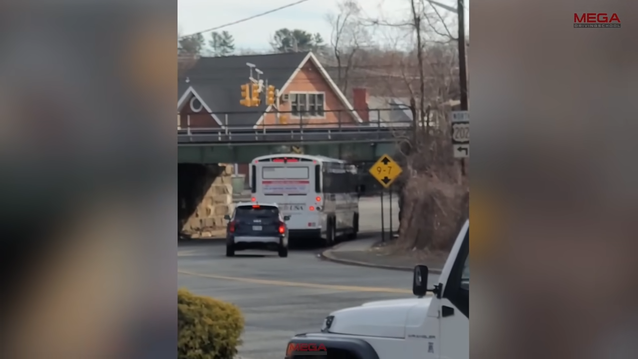 He ignored every bridge warning sign - seconds later, traffic stopped