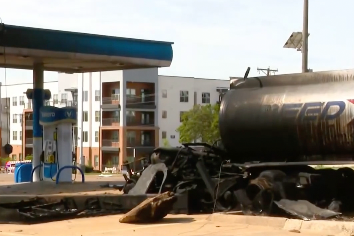 Fuel tanker bursts into flames after crash near gas station