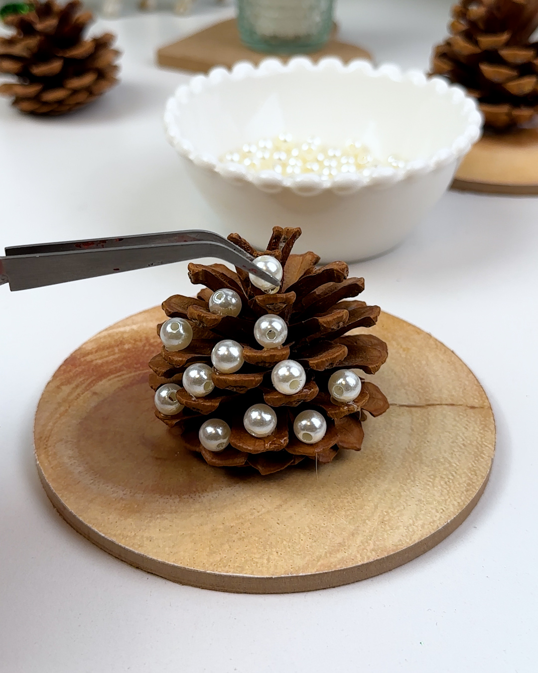 Pine cone turned into a mini Christmas tree🎄