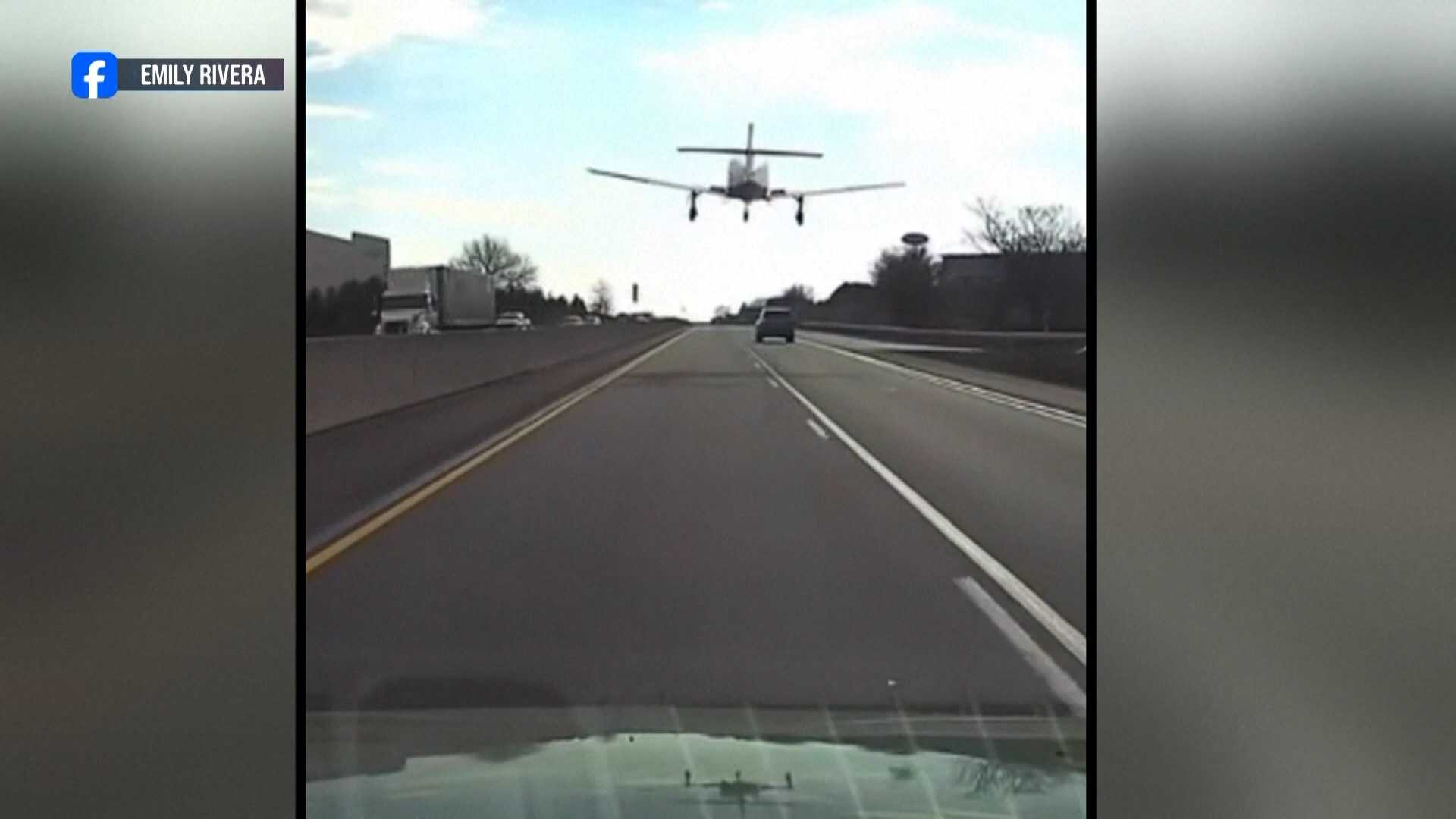 Video captures moment plane lands on interstate | 'That plane's really ...