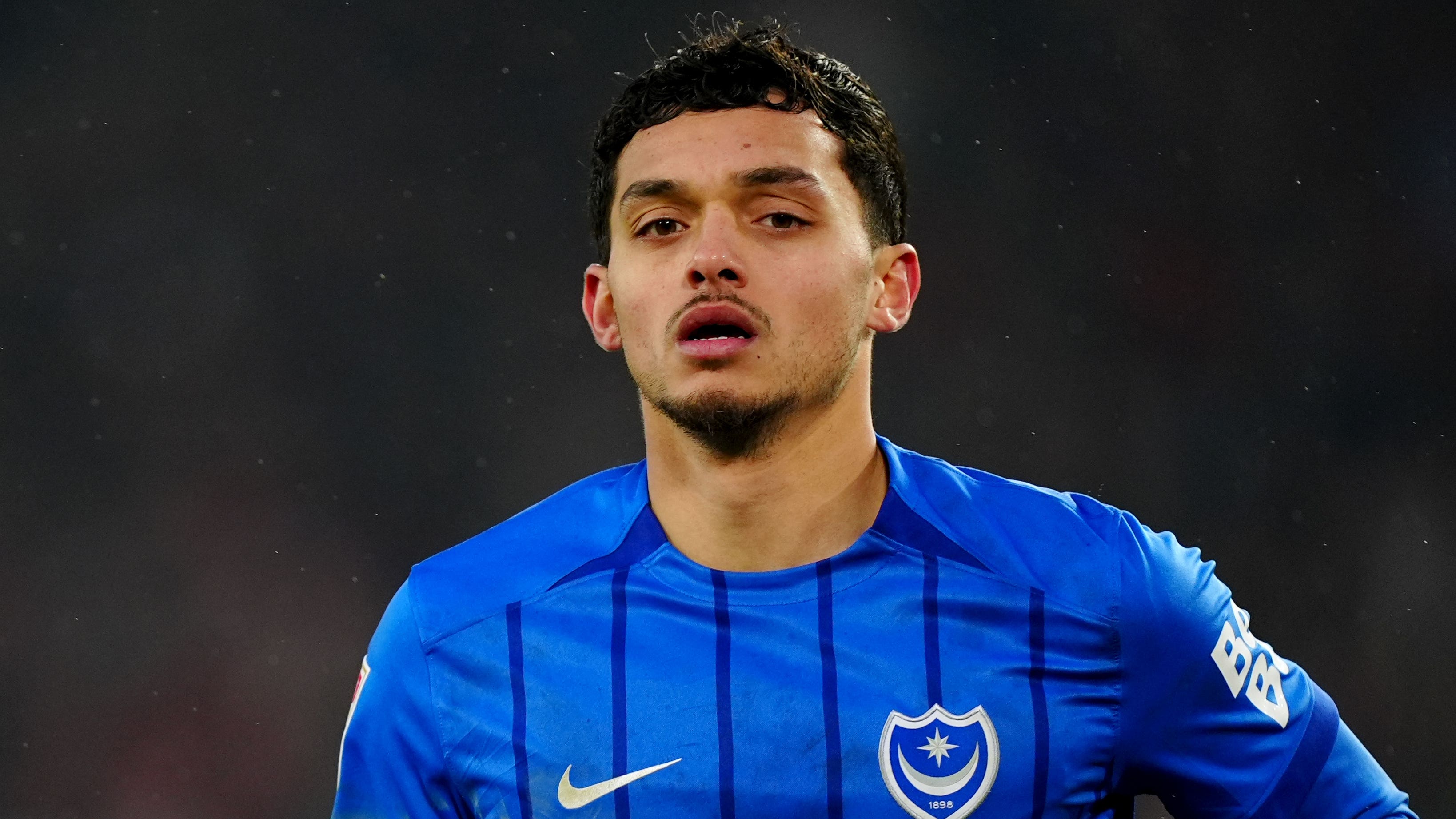 Late Andre Dozzell goal earns 10-man Pompey a draw with relegation ...