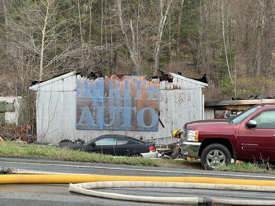 Fire destroys auto shop, part of PA 115 closed